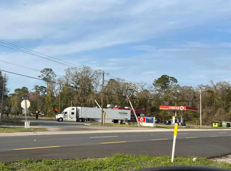 Power line downed after driver hits poles