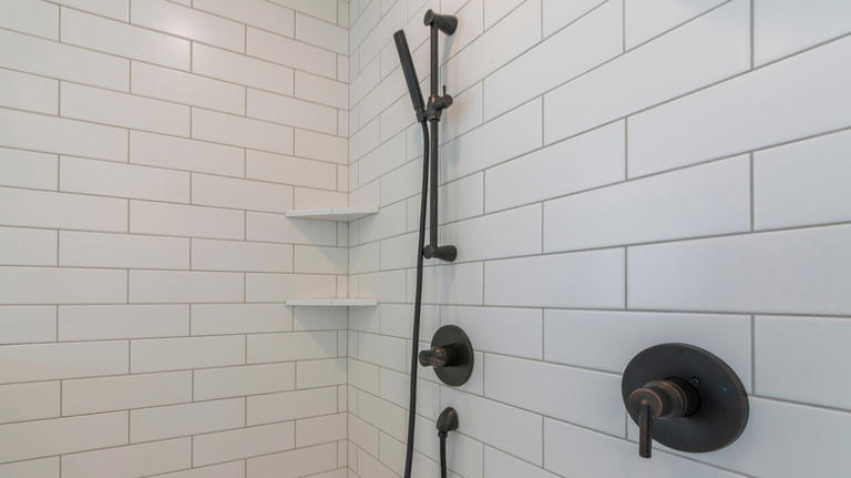 Add DIY Tile Shelves To Your Bathroom For Extra Storage And Style