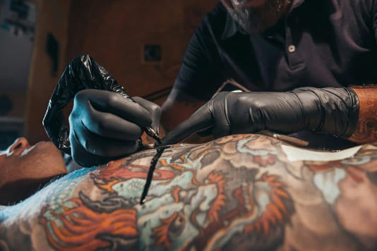 How tattoo ink travels through the body, raising risks of skin cancer ...