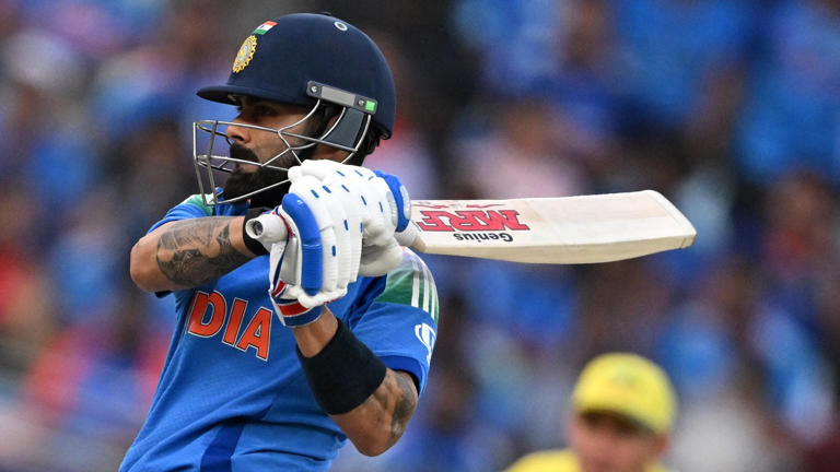 Virat Kohli in runs again as India beat Australia to reach Champions ...