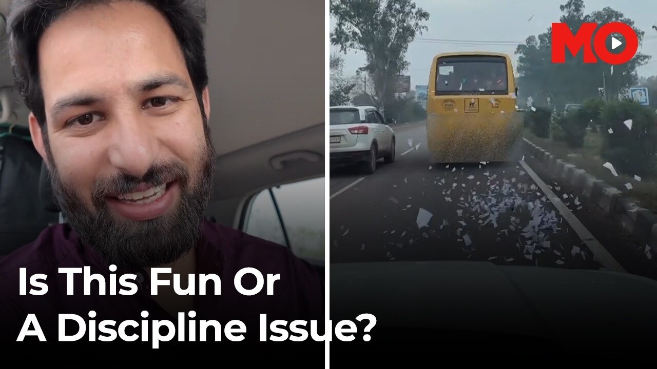 Why are these schoolkids throwing papers?