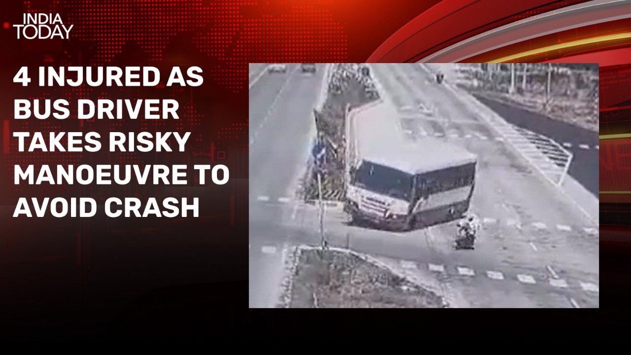 Watch: Bus with 42 passengers overturns after risky turn to avoid ...