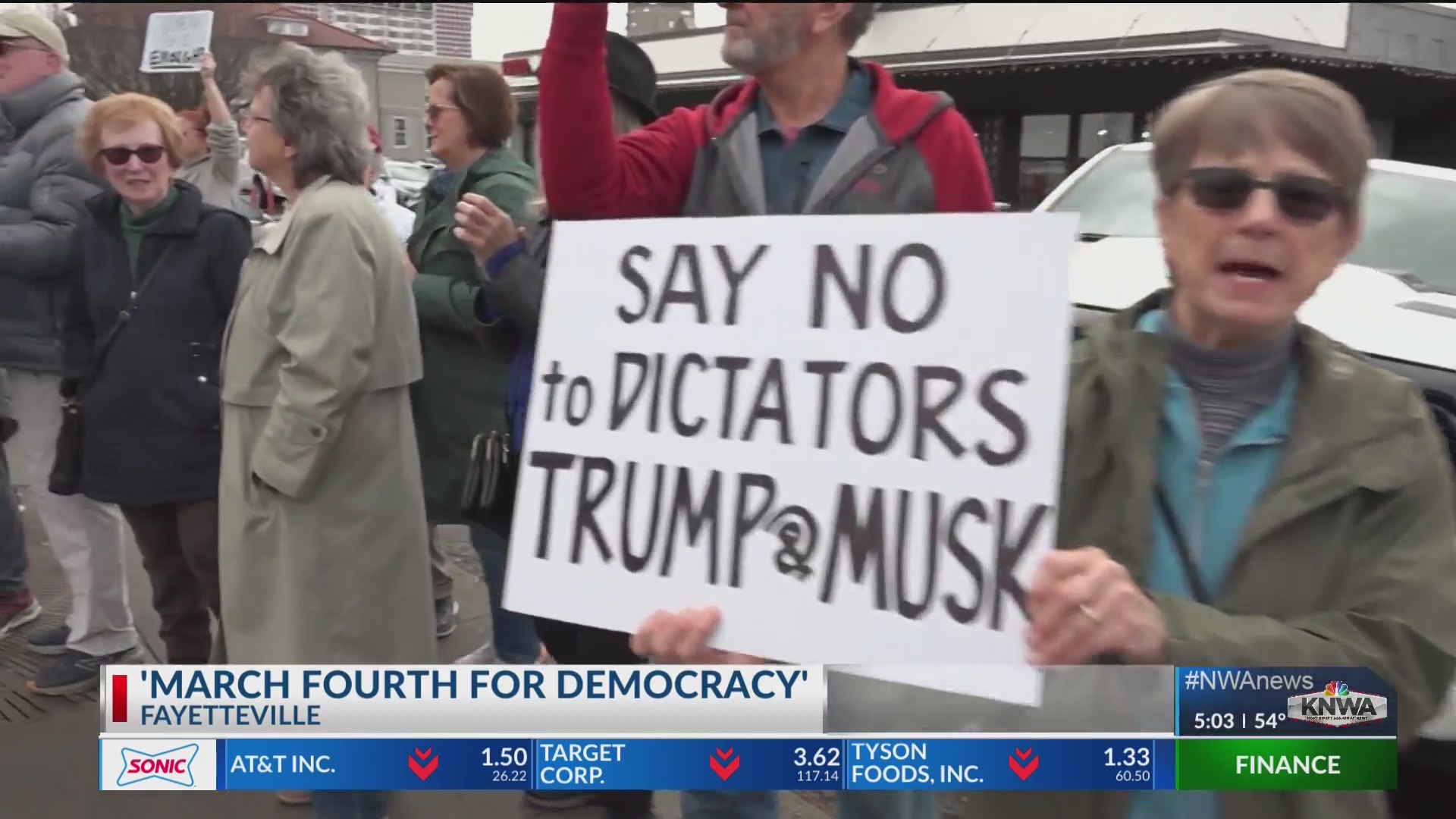 Protestors participate in 'March Fourth for Democracy' in Fayetteville