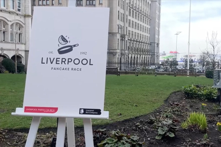 Top Liverpool chef takes historic Pancake Race crown