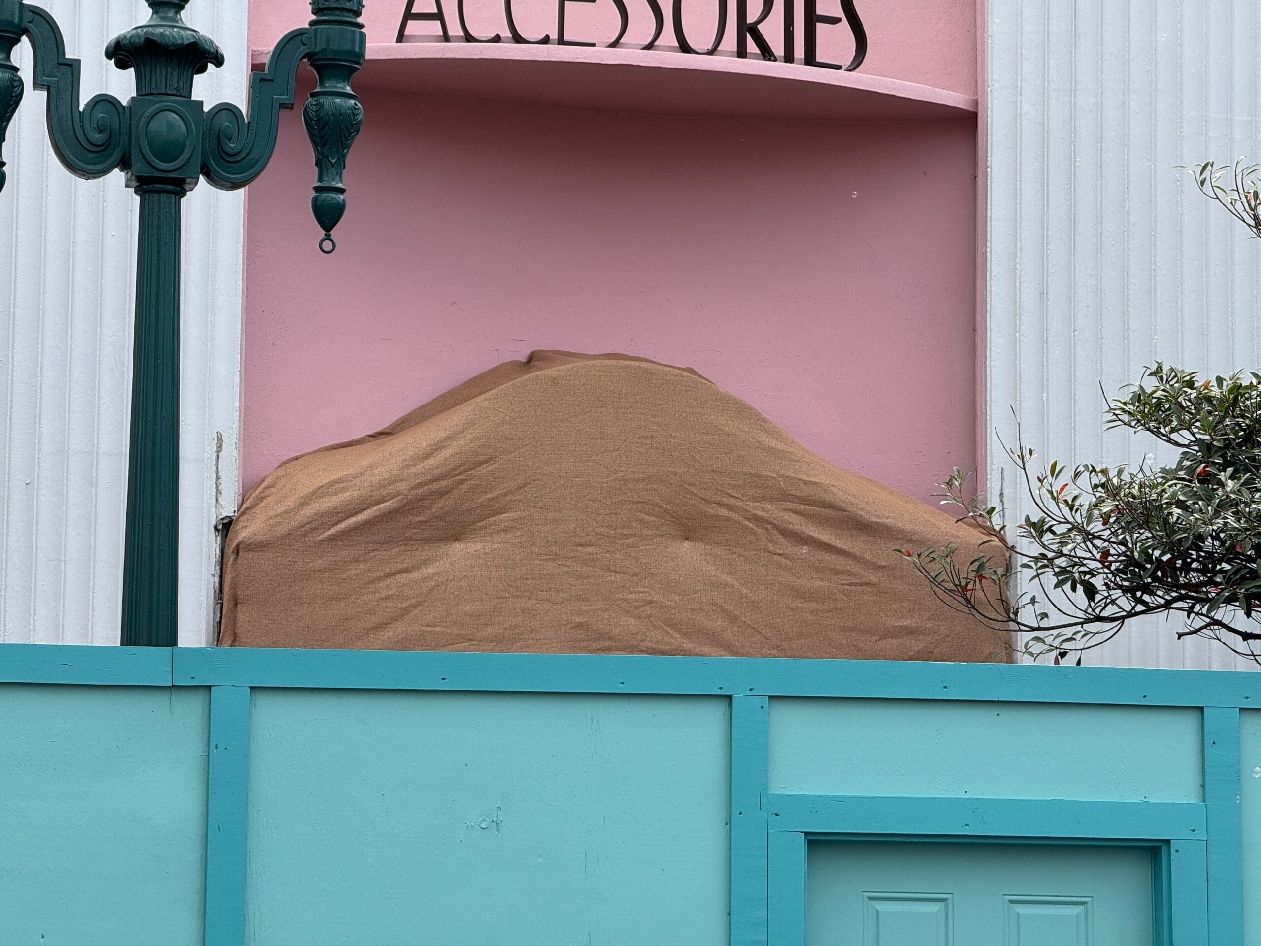 Scrim Goes Up on Broken Keystone Clothiers Doorway & Window Frames