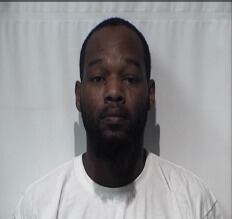 Man arrested after assaulting woman and causing injuries