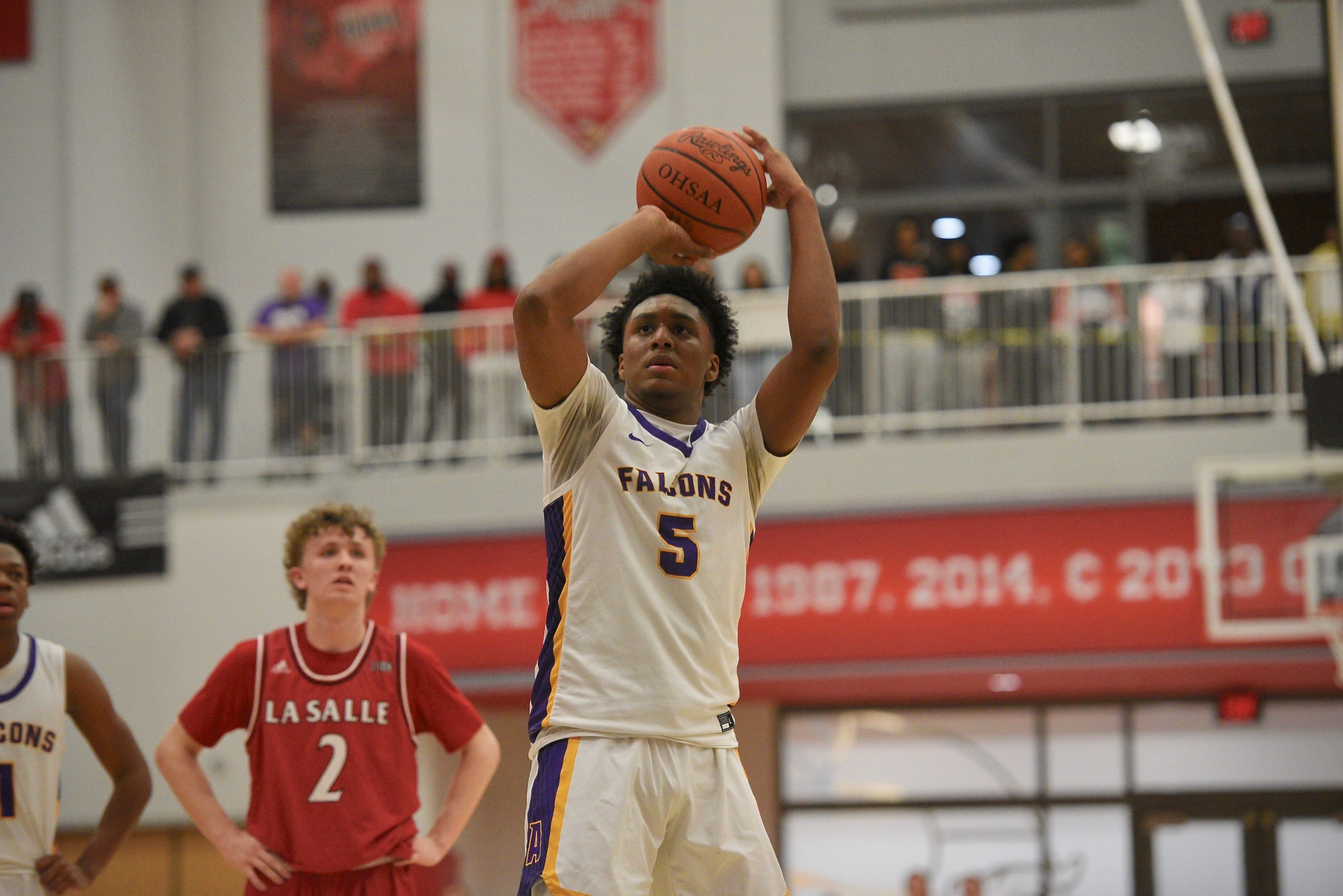 Aiken, Clark win thrillers to advance to boys basketball regional finals