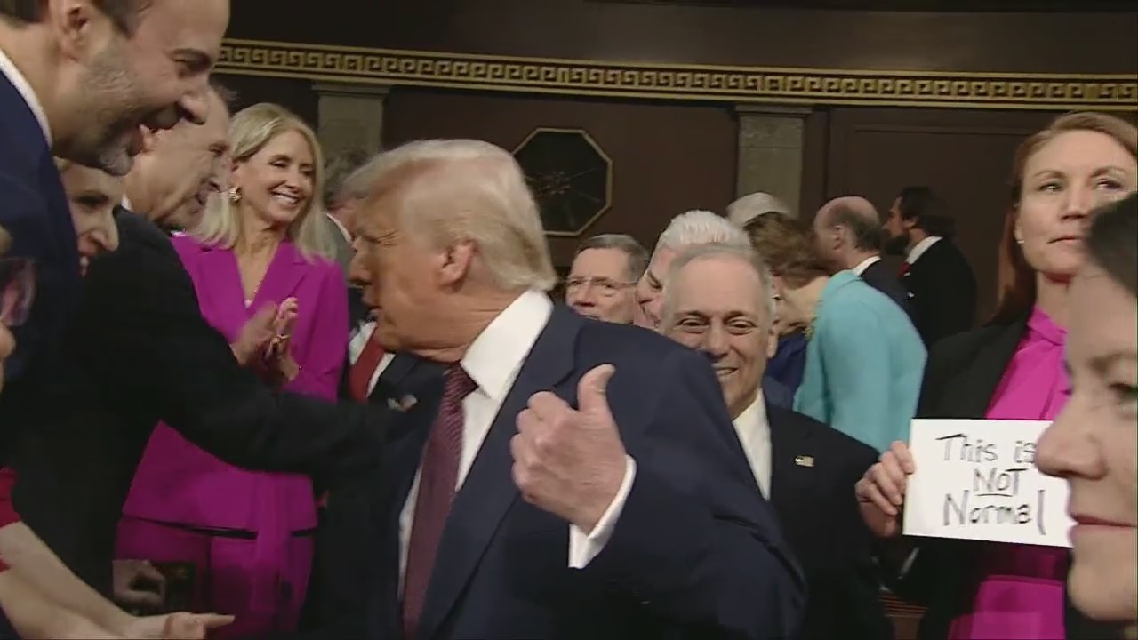 'This is Not Normal' sign seen during Trump speech