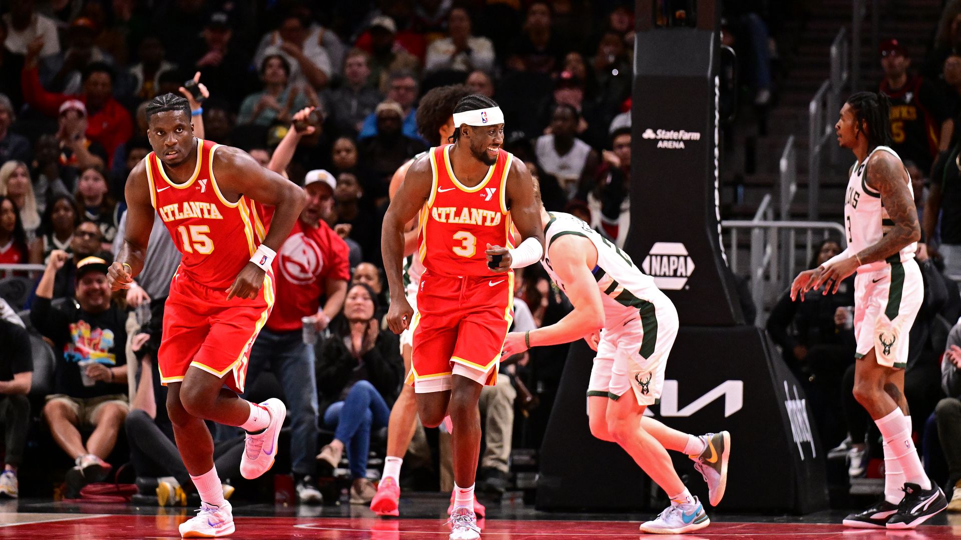 Hawks slip late in 127-121 loss to Milwaukee Bucks