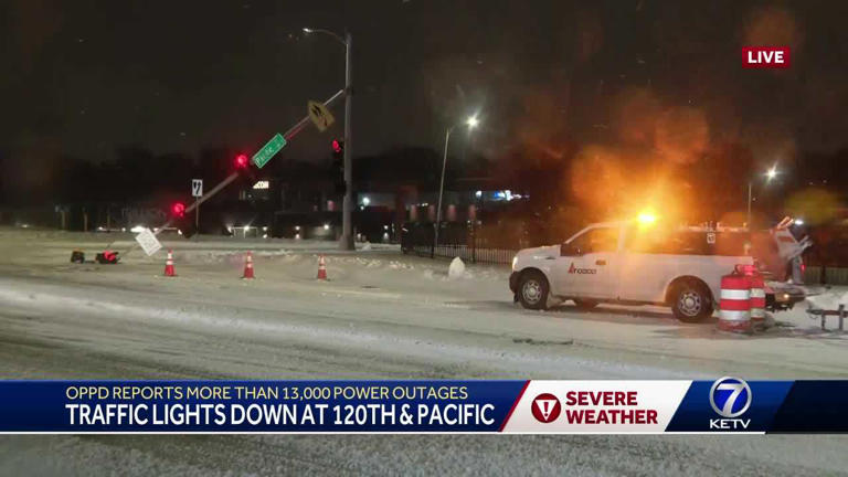 Blizzard brings gusty winds, downs street light at major Omaha intersection