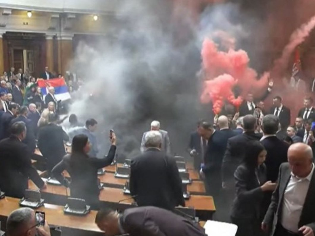 Tear gas and smoke bombs: Serbia's parliament descends into chaos