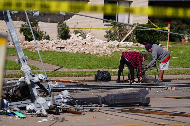 Trail of destruction from deadly storms in 20 images as blizzards ...