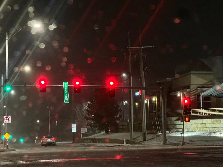 How windy was it, and how much snow fell in Kansas City?