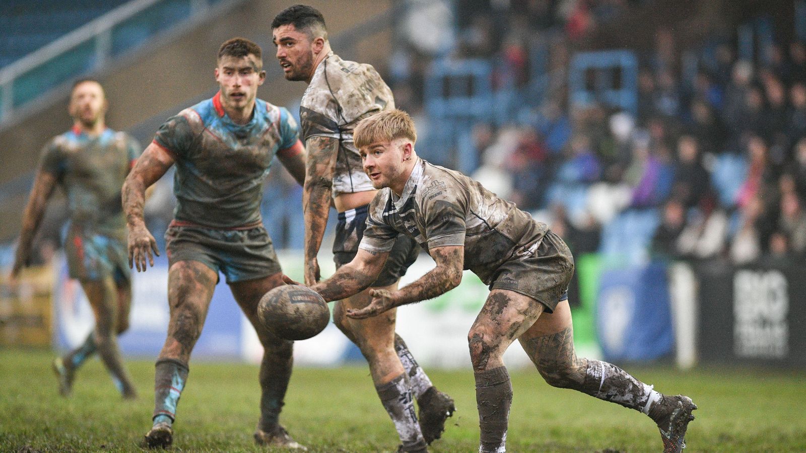 Championship big hitters snap up international half-back on lengthy deal