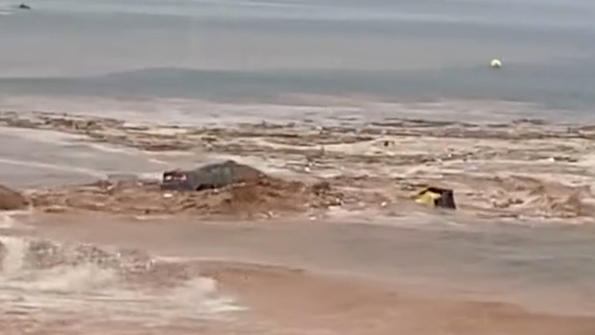 Car washed out to sea during flooding in Canary Islands
