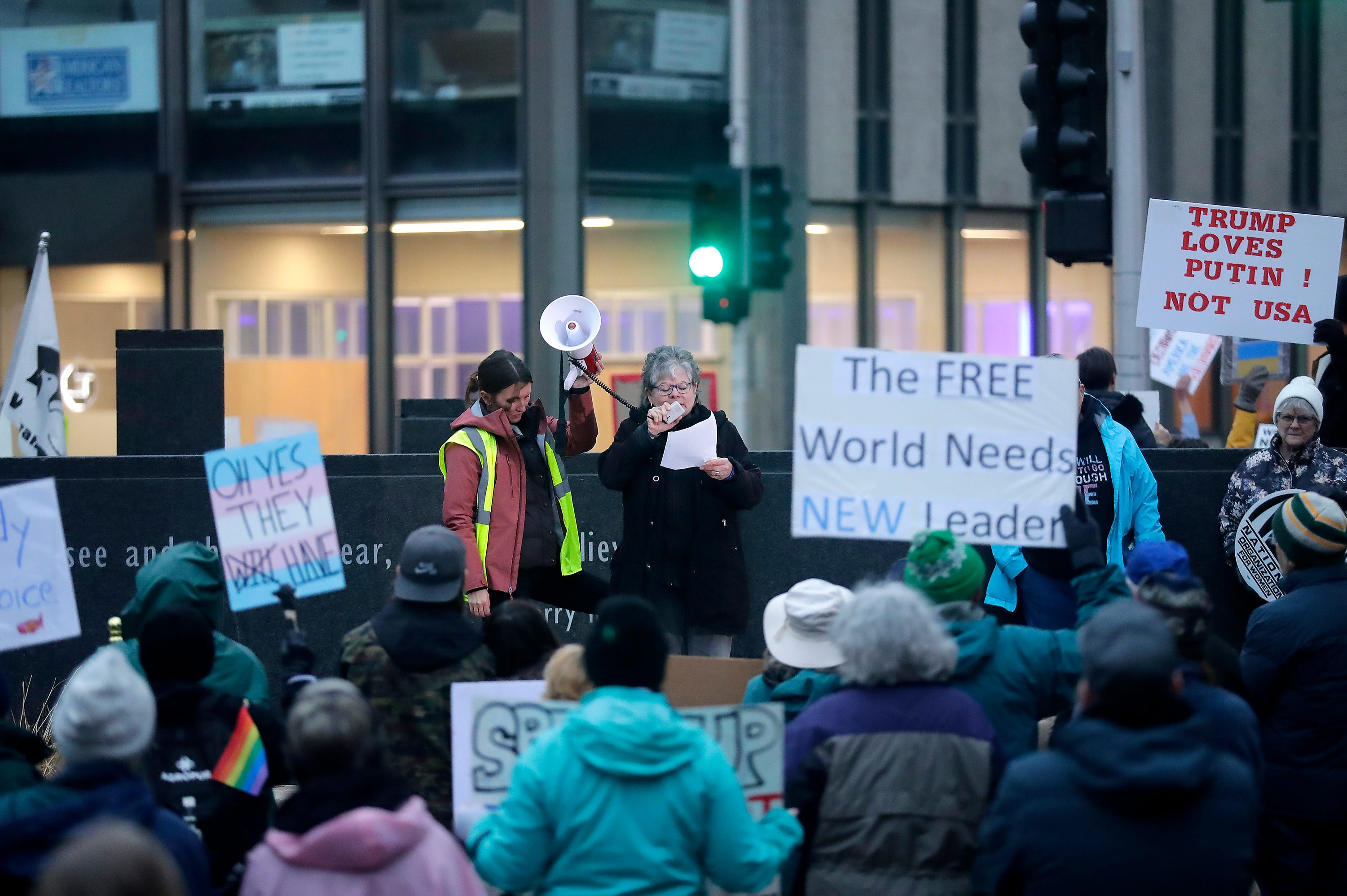 Protesters gather in Appleton's Houdini Plaza ahead of Trump's address ...