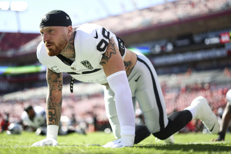 Raiders sign Pro Bowl DE Maxx Crosby to 3-year deal reportedly valued at $106.5M, the richest ...