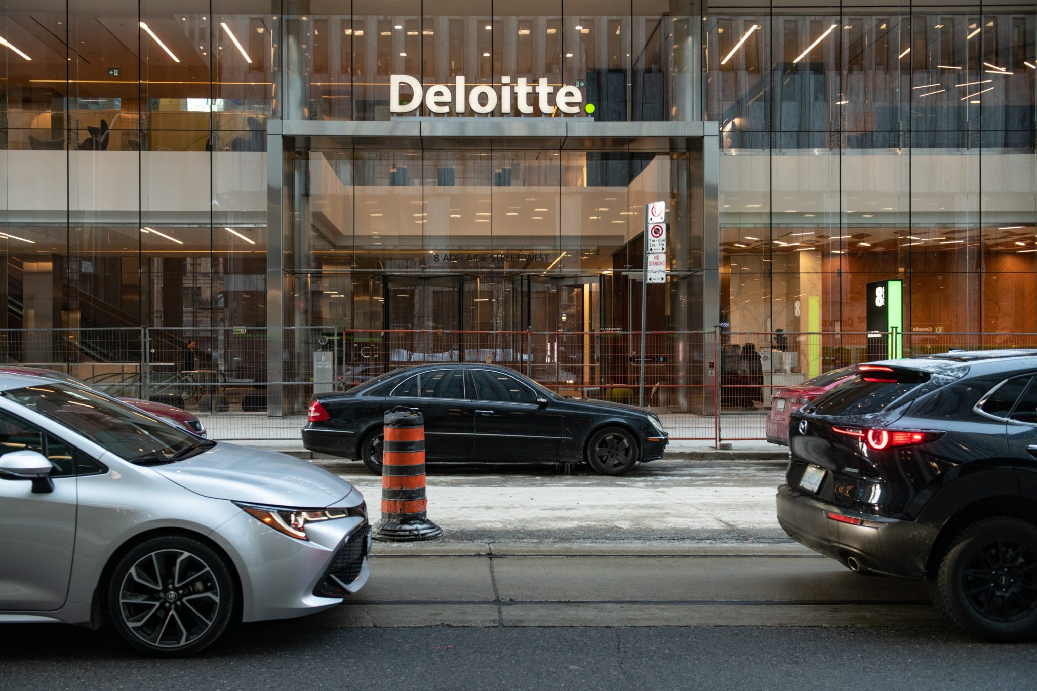 Deloitte says office attendance will be considered as part of some ...