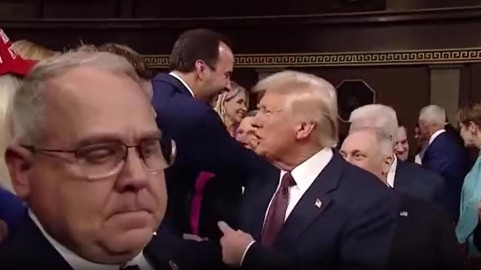 Texas lawmaker yanks away 'This is not normal' sign