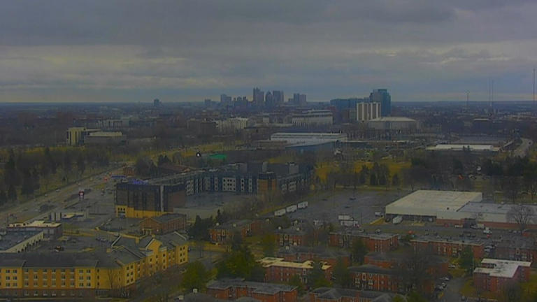 Brisk, late clearing, light rain Friday, nice weekend