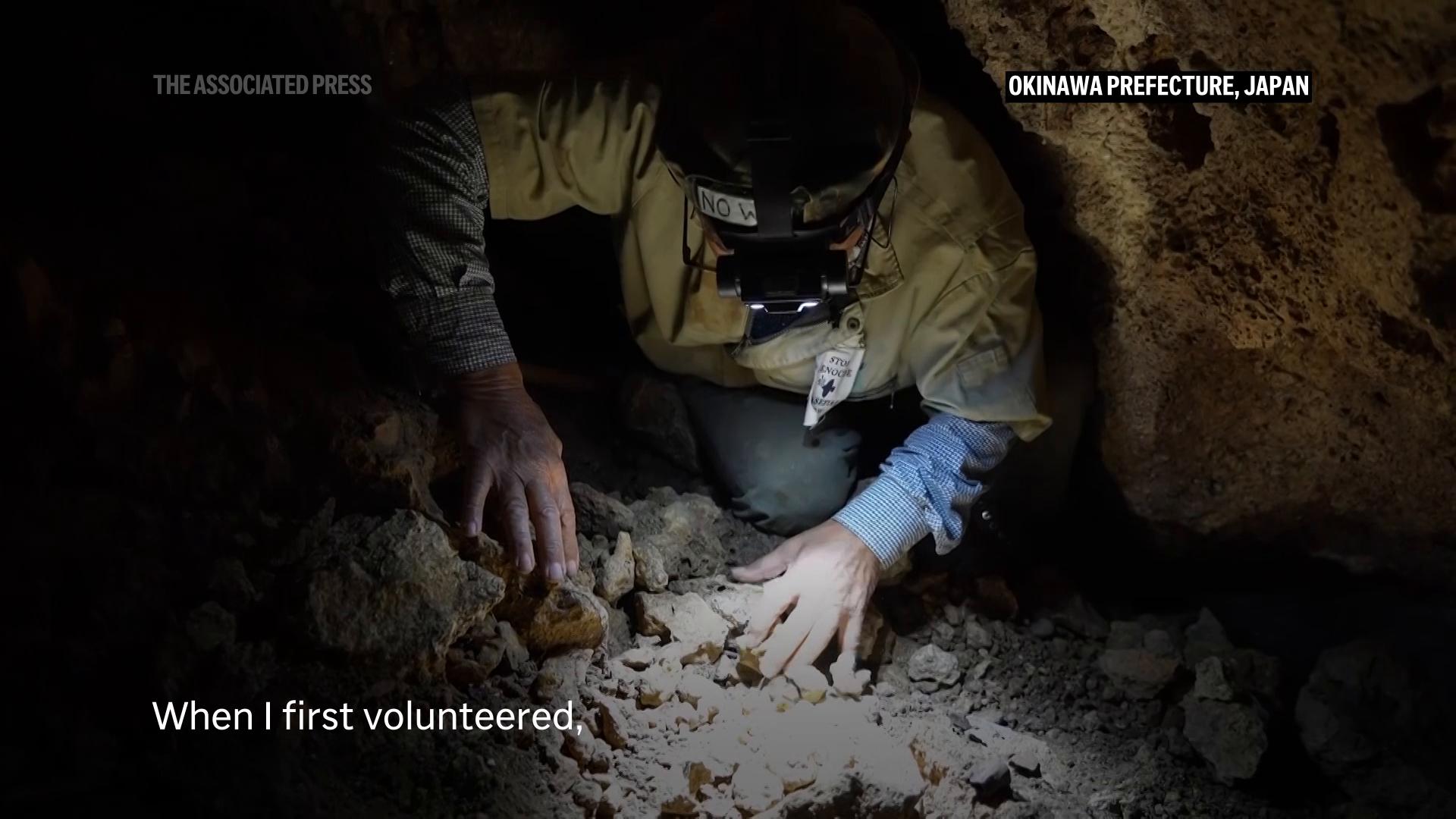 Okinawan bone digger searches caves for the remains of WWII dead