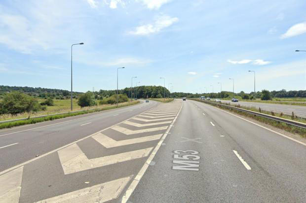 Emergency services called after car overturns on M53
