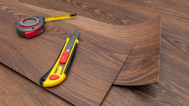 The Cutting Hack That Makes Installing Peel-And-Stick Vinyl Flooring A Breeze