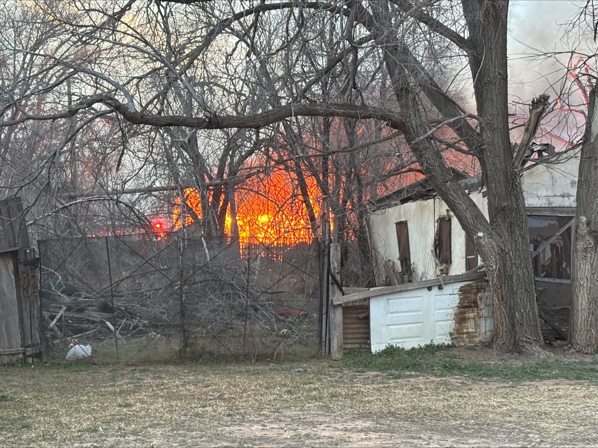 Woman arrested in connection to fire Thursday night in east Lubbock County