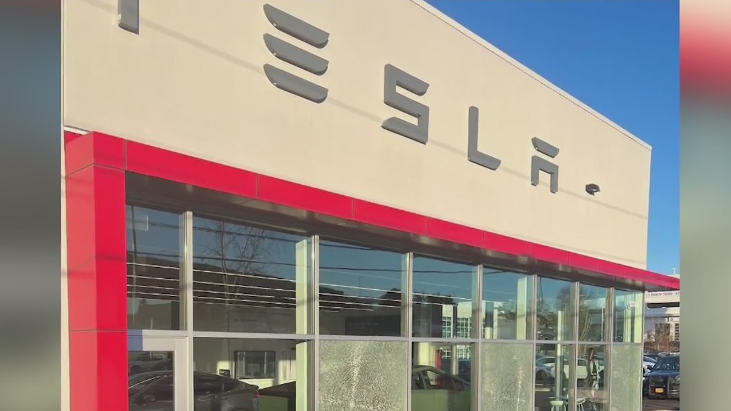 Shattered windows, bullet holes discovered at Tesla dealership in Tigard