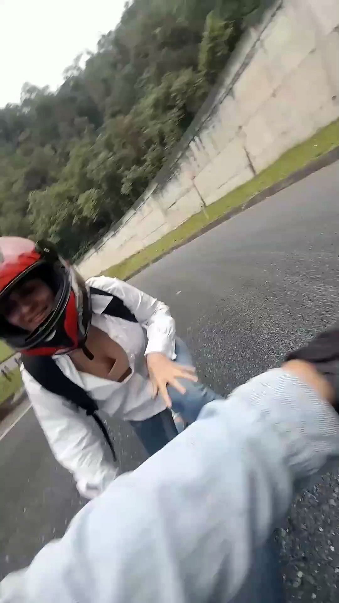 Motorcycle Rider and Pillion Slip and Fall on Wet Road