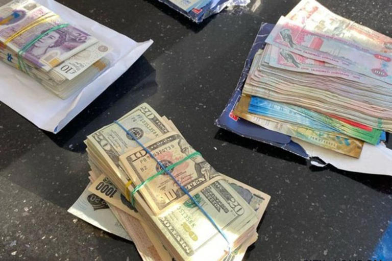 Four arrested as police probe multi-million pound company