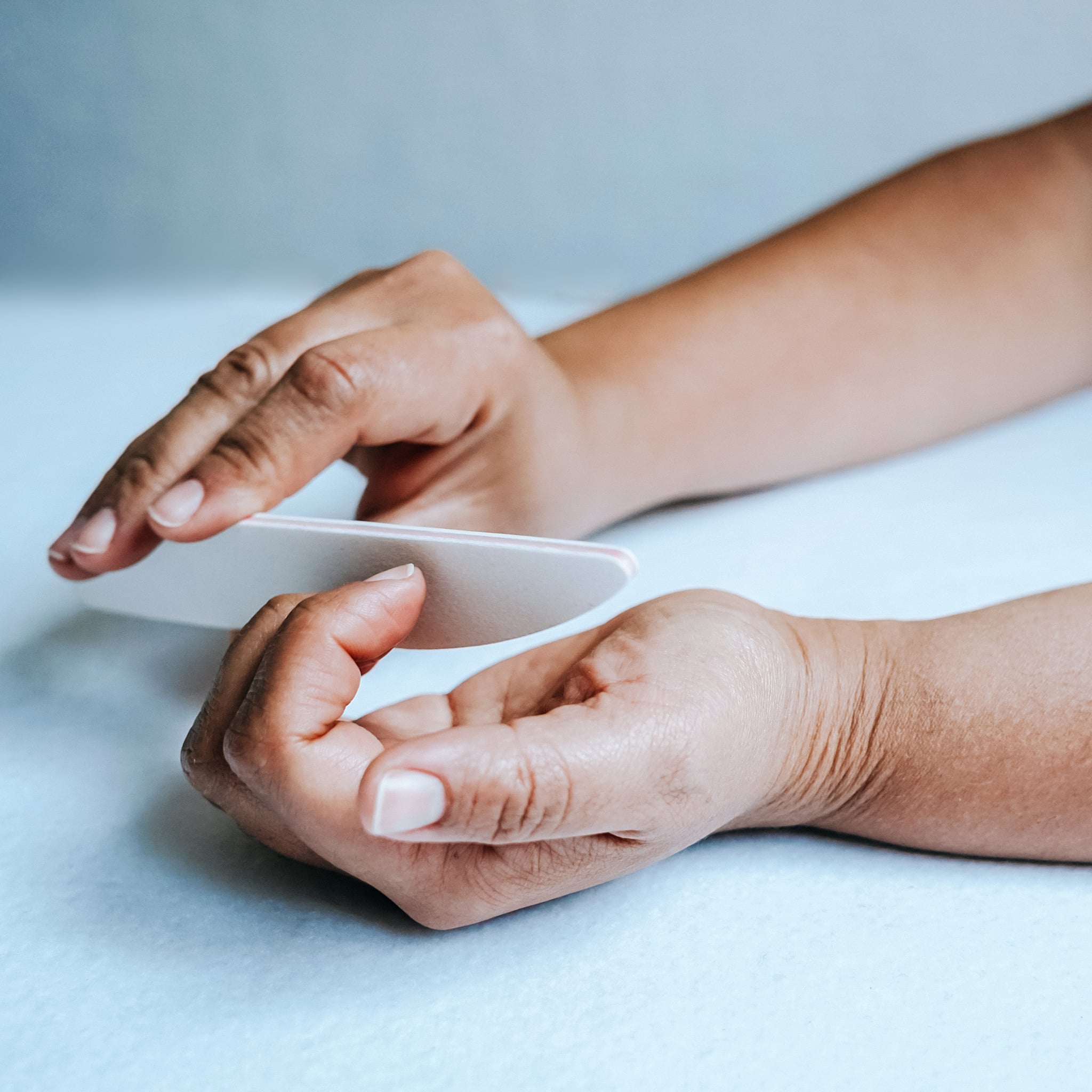 What Causes Those Black Lines on Nails? Experts Explain