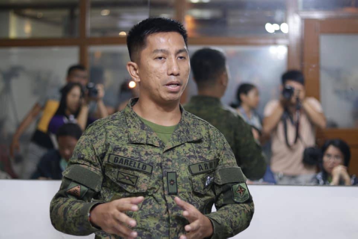 Army soldiers tightly guarding fallen jet