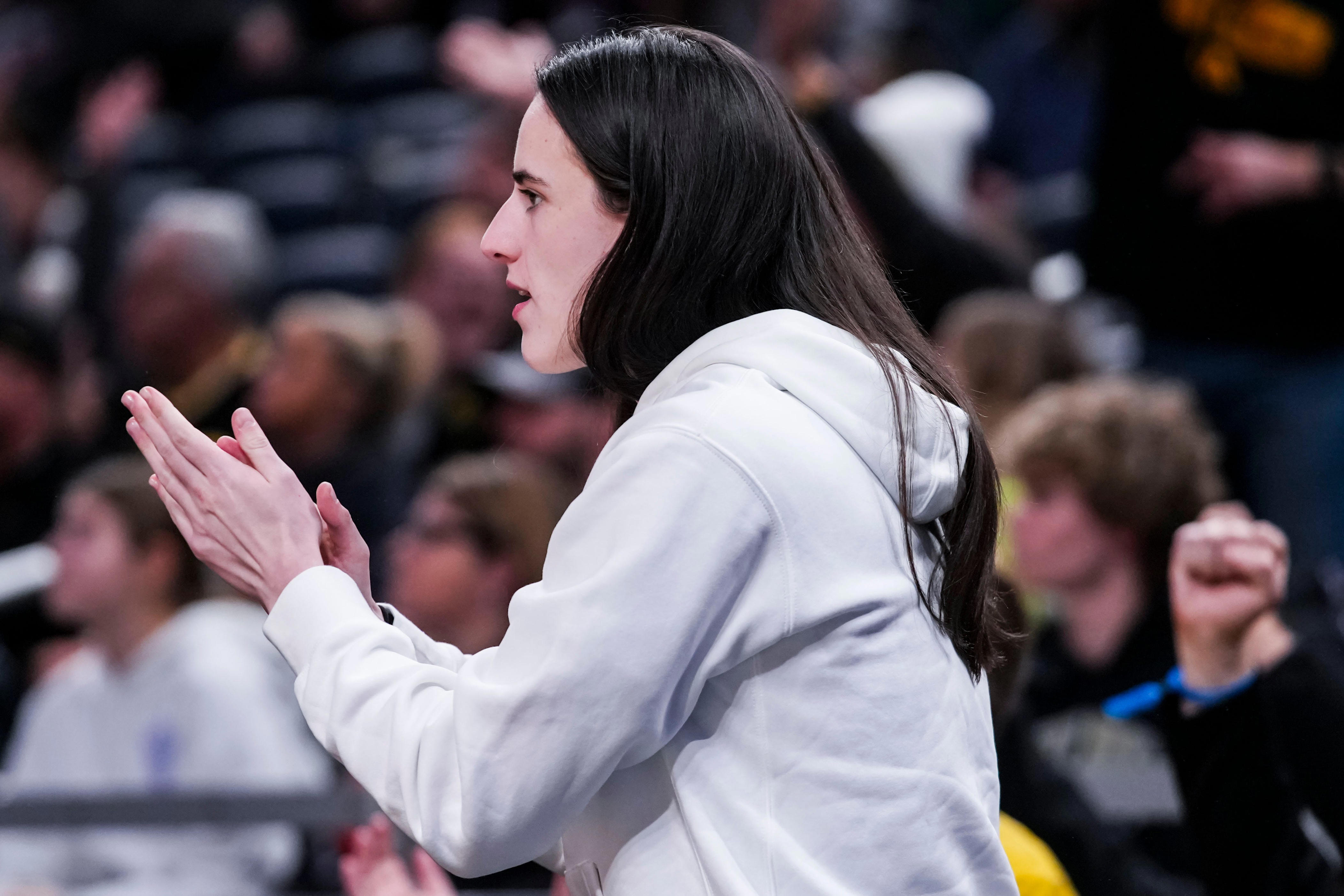 Caitlin Clark attends third straight day of Big Ten women's basketball ...