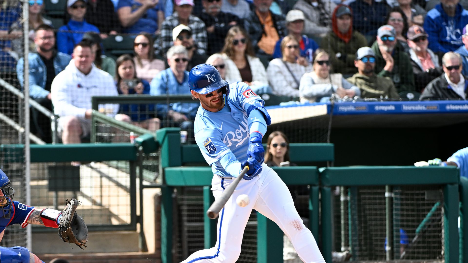 Royals use loud contact to win rain-shortened game 8-2 over Angels