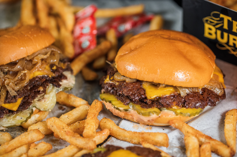 Fans flock to opening of Trill Burger's second location in Spring