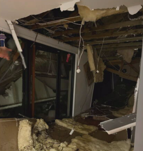 Homes smashed by trees, fires sparked on power lines