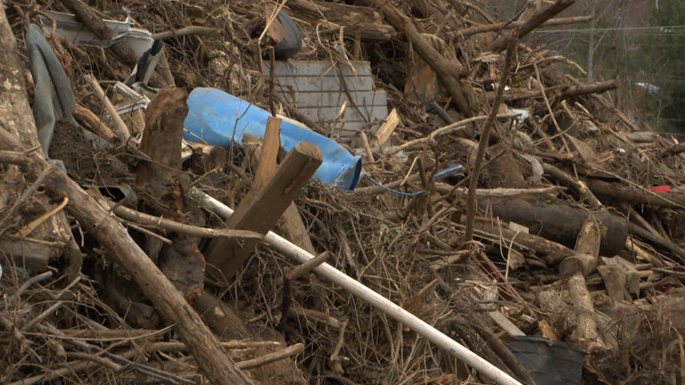 70,000 cubic ft. of debris removed from the Doe river in the last month
