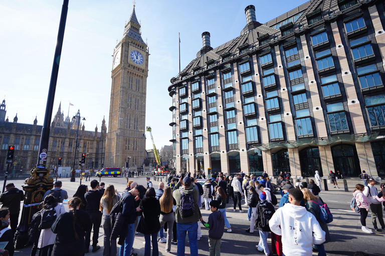 Parliamentary tours cancelled as man remains metres up Elizabeth Tower