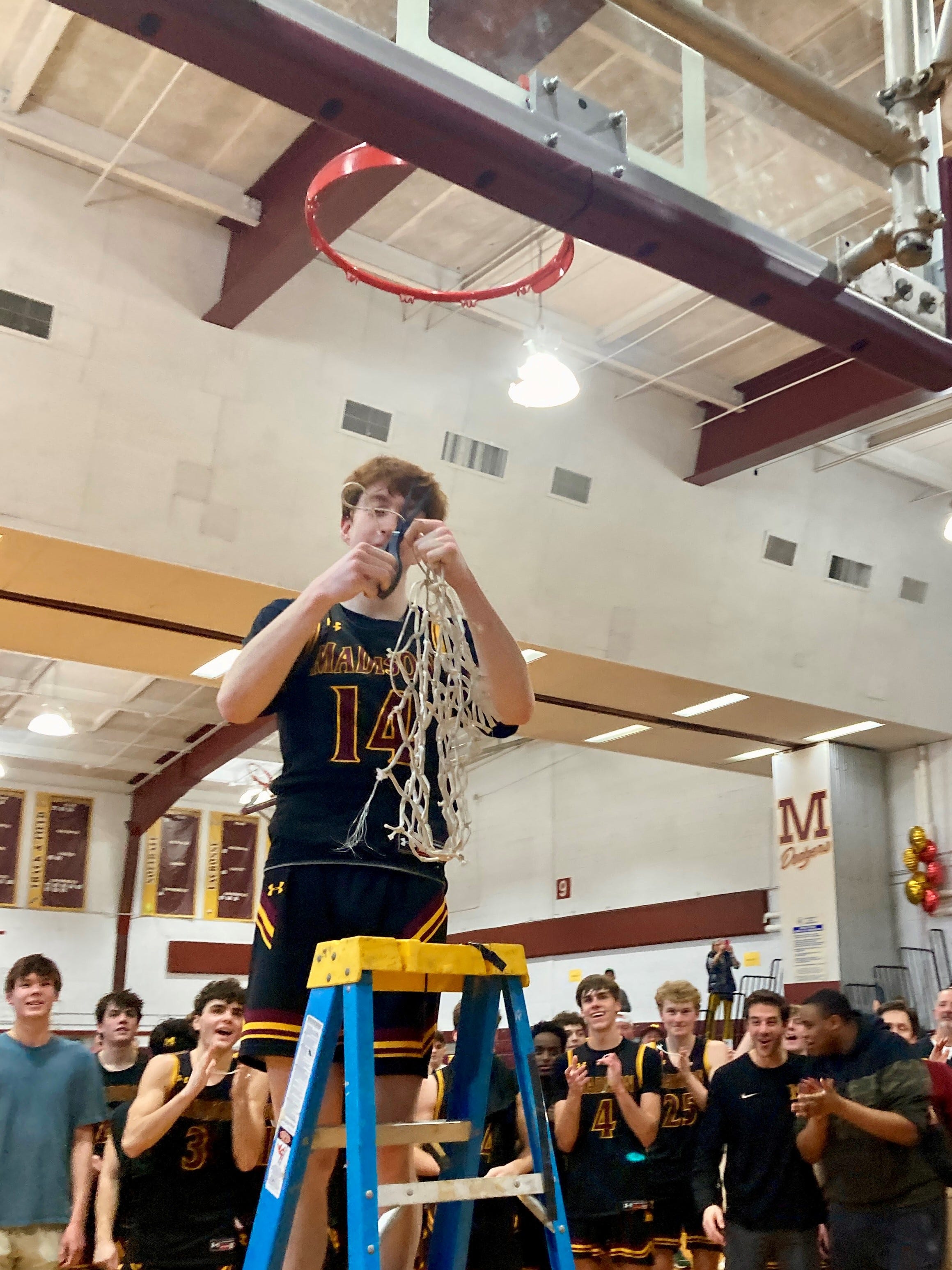 Madison boys make school history, girls defend trophy in basketball ...