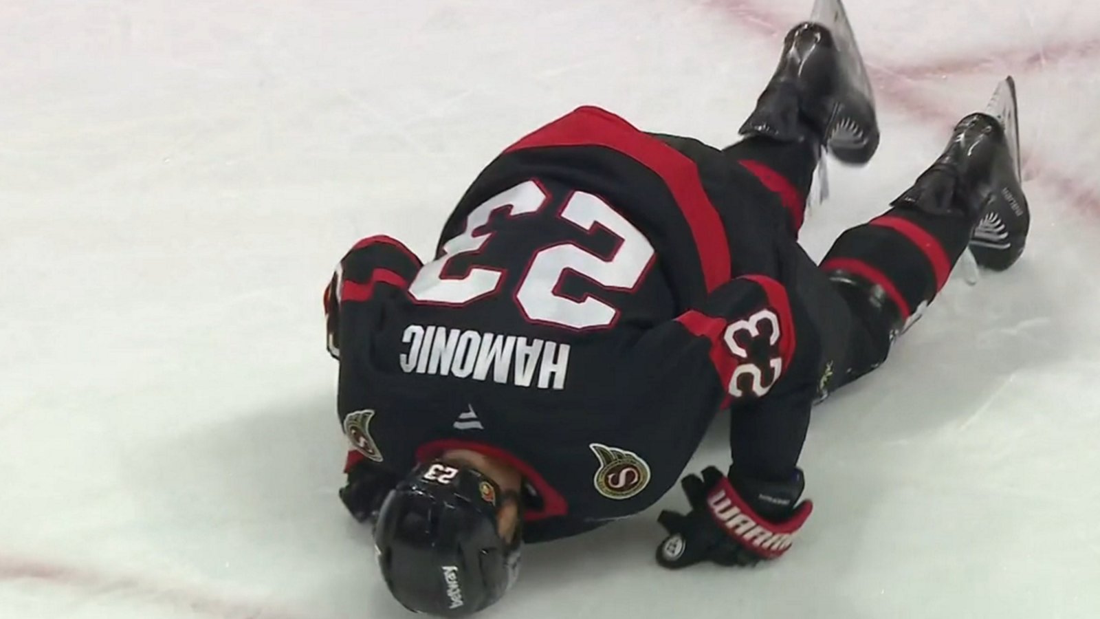 Travis Hamonic goes down one day after the trade deadline.