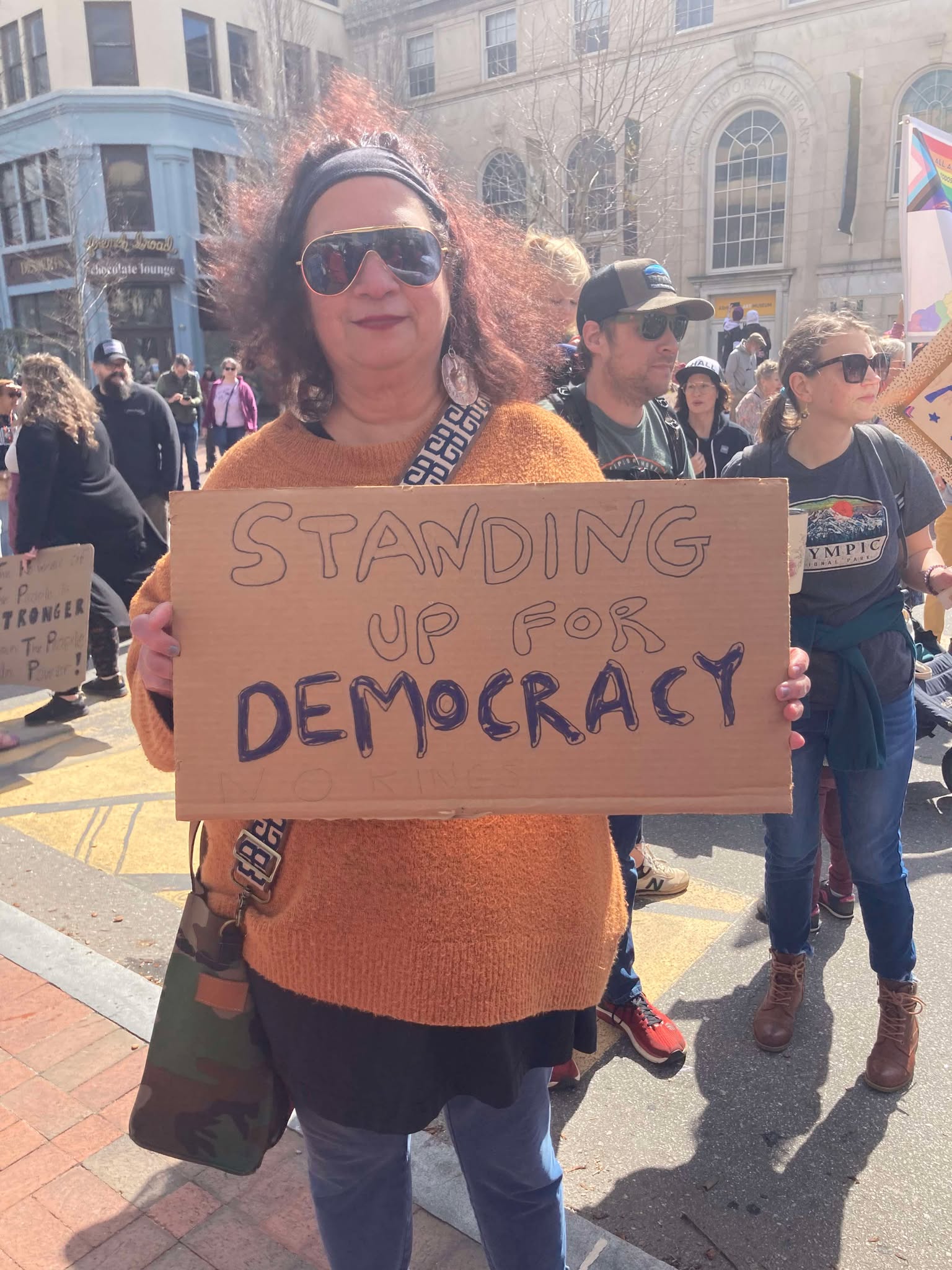 Hundreds rally in downtown Asheville for women's rights, education ...