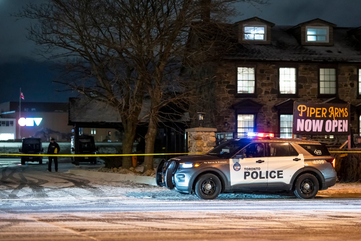 Shooting in Toronto pub leaves at least 12 injured as three suspects on ...