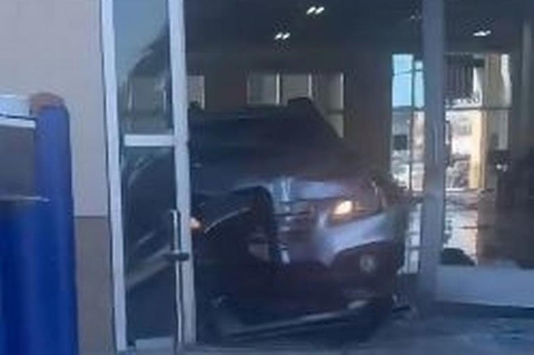Furious customer rams car into CarMax showroom in Los Angeles leaving ...