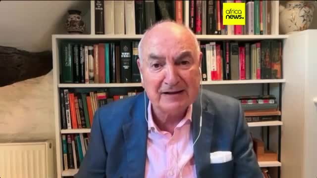 Man descends Big Ben tower after climbing with Palestinian flag