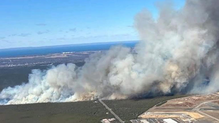 Long Island brush fire: Crews knock down blaze but wind threats remain