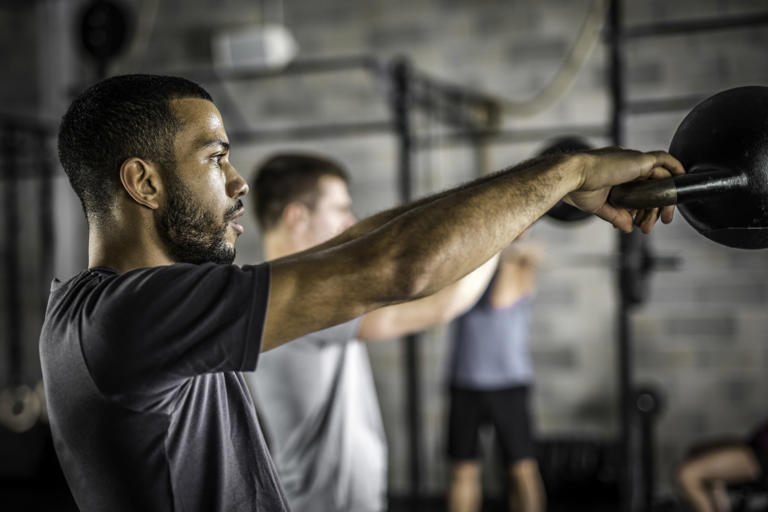 14 Dangerous Kettlebell Mistakes You're Making, According to a Trainer