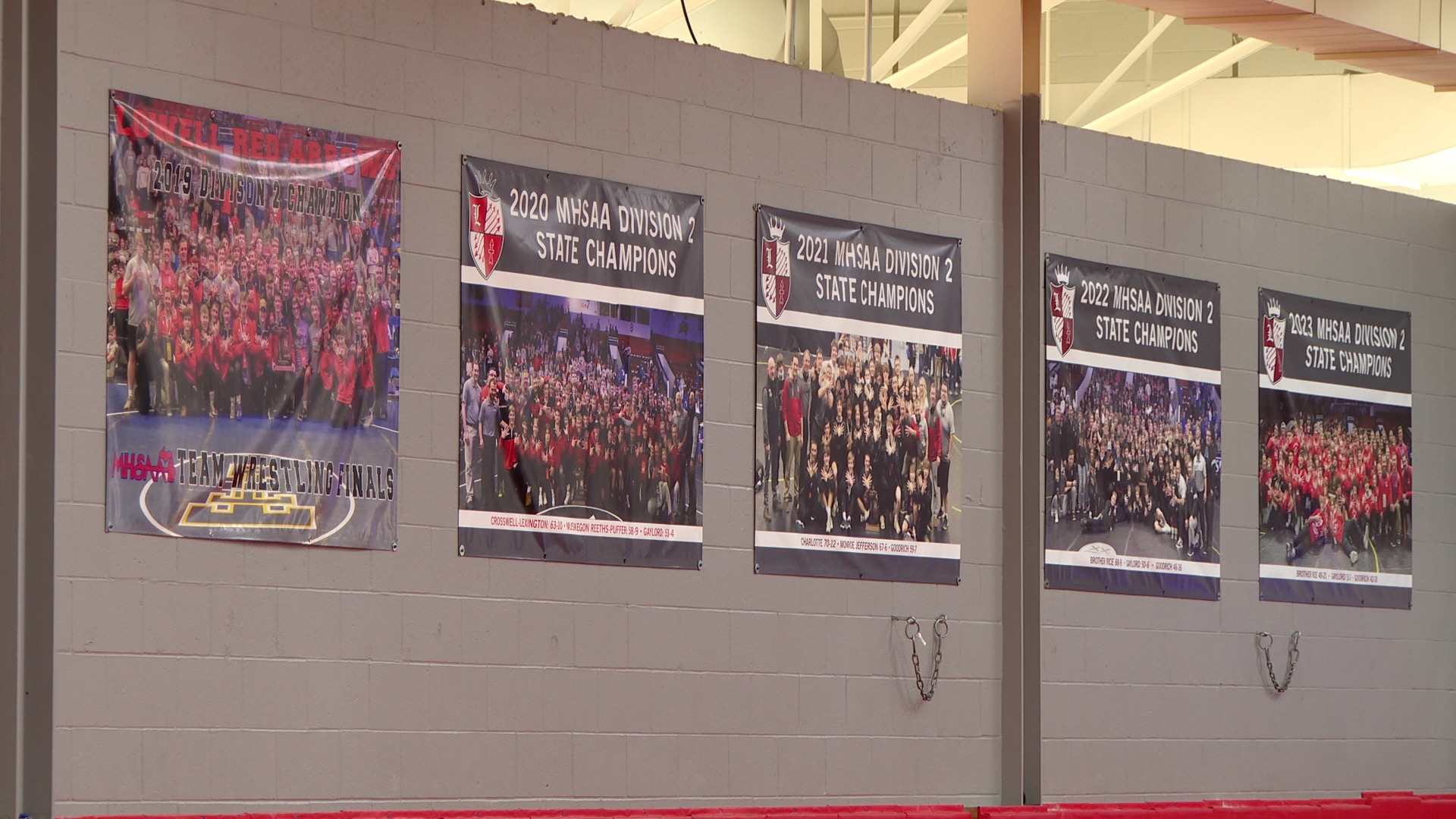 Lowell wrestling wins 12th straight team title