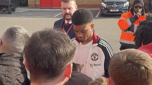 Amad Diallo seen signing autographs outside Old Trafford