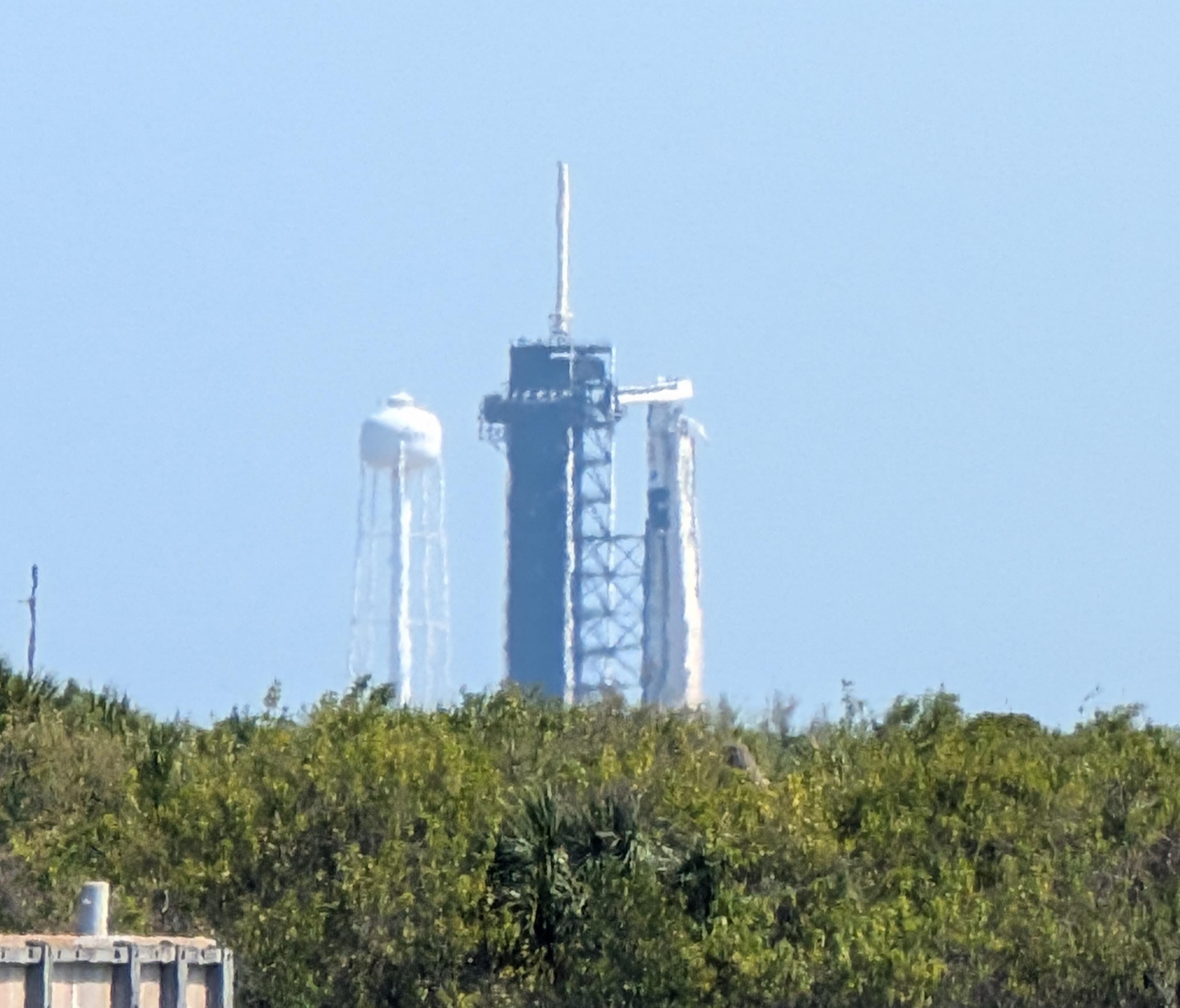 SpaceX Falcon 9 rocket raised on KSC Pad 39A ahead of NASA's Crew-10 launch